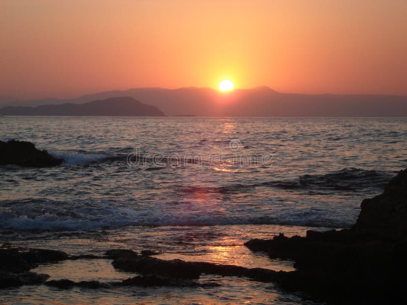 Sunset on Crete stock photo. Image of sand, scenic, ocean - 18265192