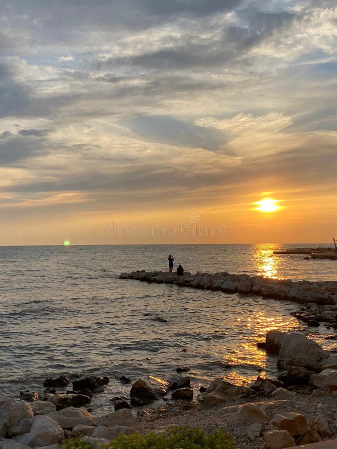 Sunset in croatia stock image. Image of sunrise, setting - 264966575