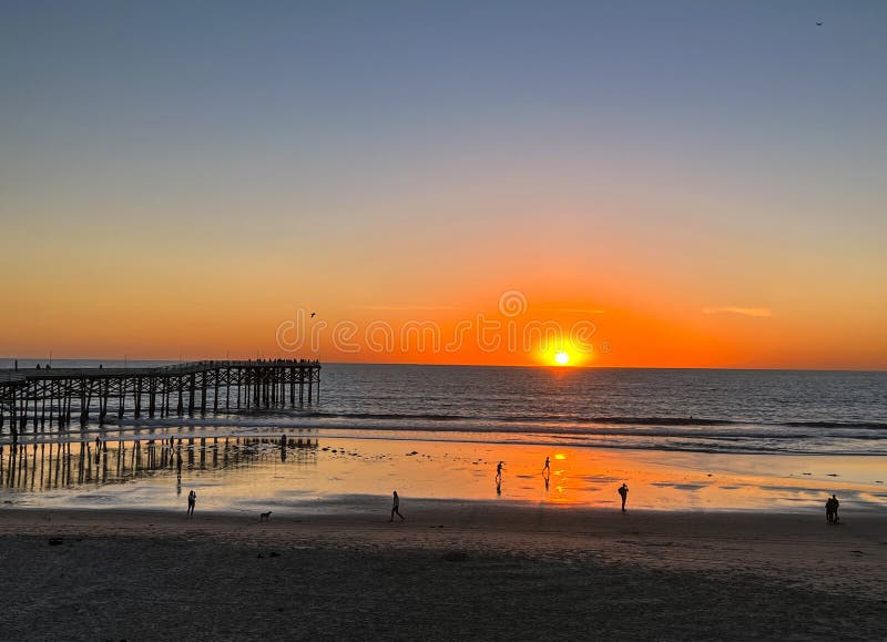 Sunset at crystal pier stock photo. Image of silhouette - 241802010