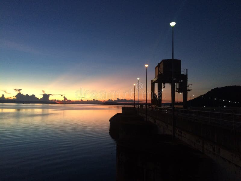 Sunset in Dam stock photo. Image of sunset, water, lighthouse - 85492848