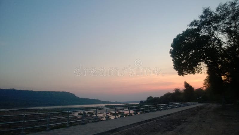 The sunset at the dam stock image. Image of view, mountain - 160611937