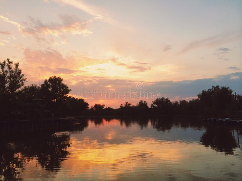 Sunset in the Danube Delta stock image. Image of landscape - 63860551