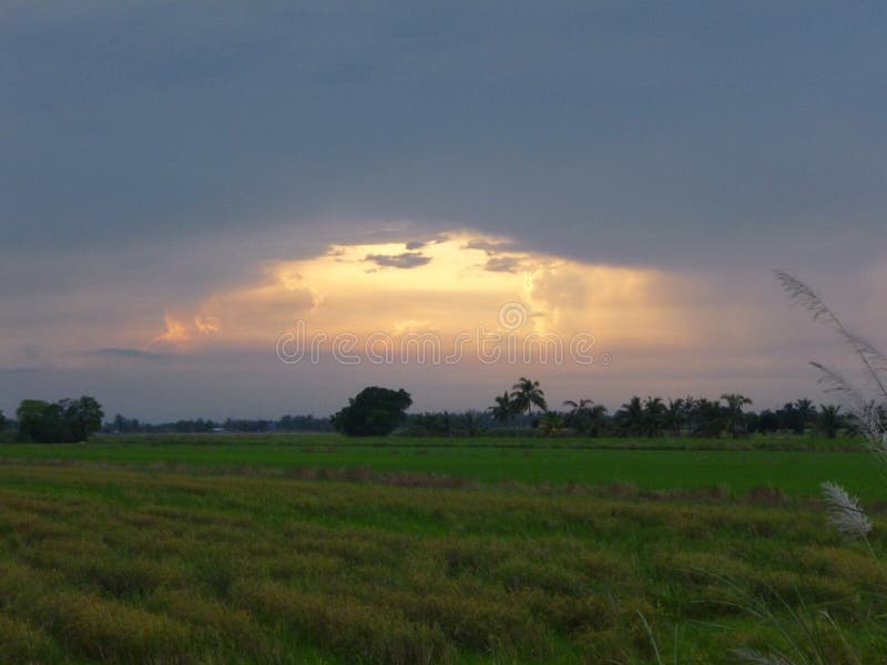 Sunset on dark cloud stock photo. Image of beam, nature - 45427134