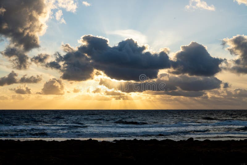 Sunset with Dark Clouds Over Ocean Horizon Stock Photo - Image of ocean ...