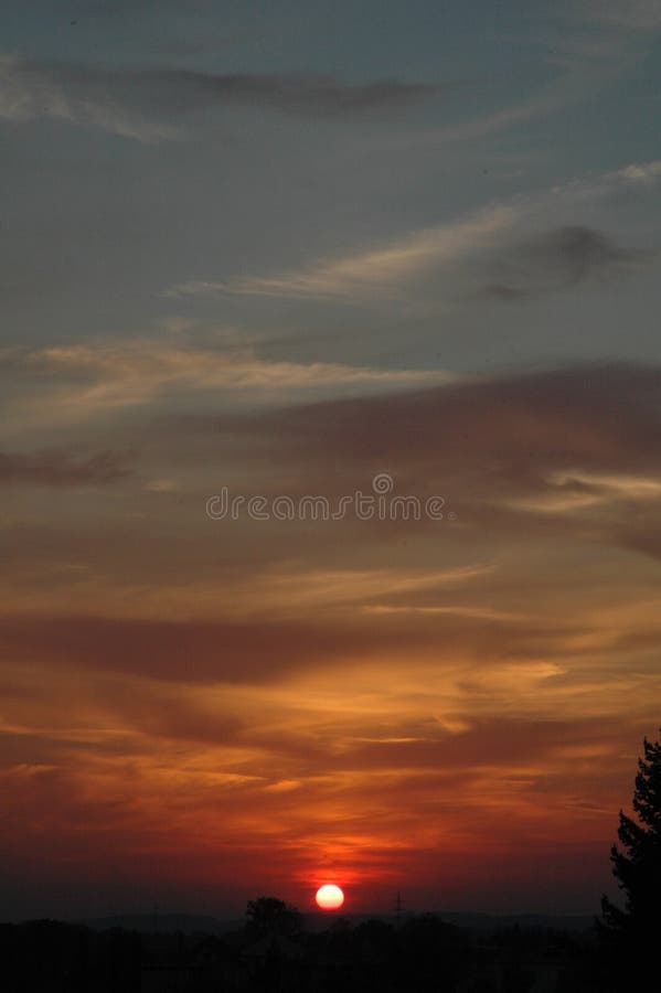 Sunset over the town stock photo. Image of sunset, dawn - 102112542