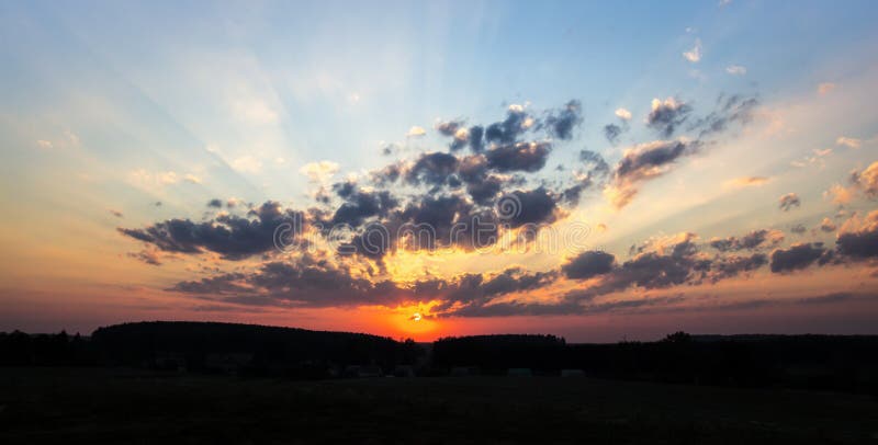 Sunset Dawn Sun Rays Over the City Sky Field of Flowers Stock Image ...