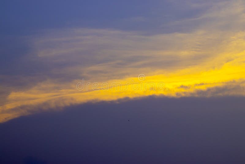 An Sunset Day with a Beautiful Yellow and Blue Sky Stock Photo - Image ...