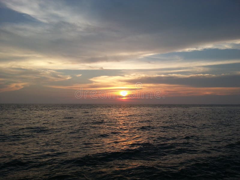 The sunset day stock image. Image of sunset, cloud, orange - 209057219