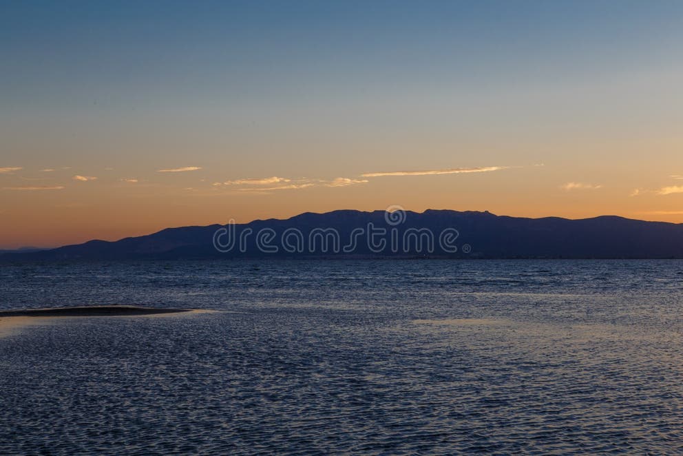 Sunset in the delta stock image. Image of blue, view - 121180765