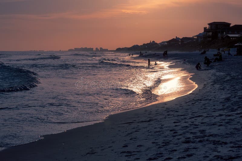 Sunset on Destin Beach stock photo. Image of tourism - 139747004