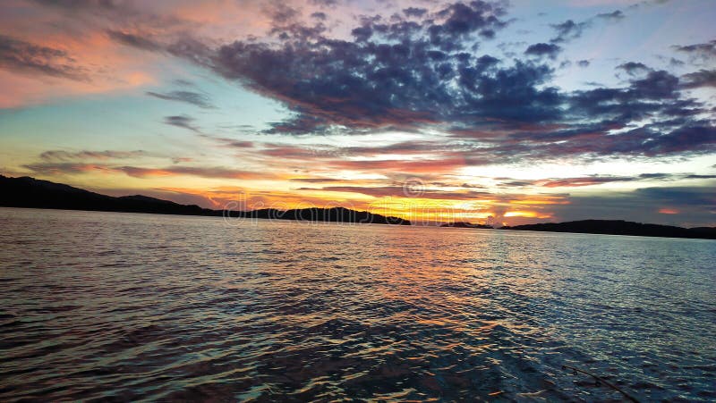 Sunset at Sea / Sunset Di Laut 2 Stock Photo - Image of horizon, wave ...