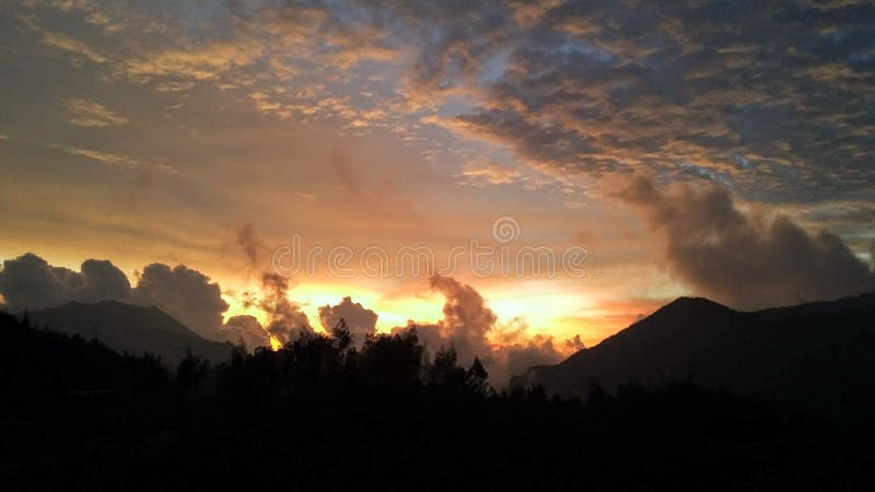 Sunset in Dieng stock photo. Image of plain, morning - 266652868