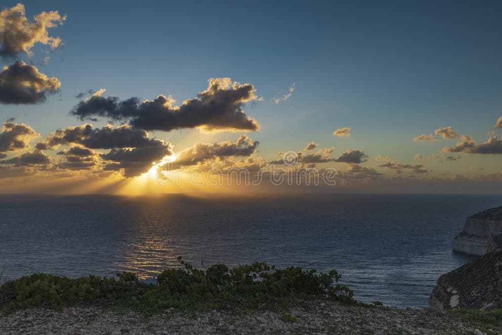 A sunset at Dingli Cliffs stock photo. Image of dingli - 235974188
