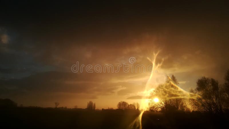 Sunset with Distorted Light Effect Caused by Water Drop on the Lens ...