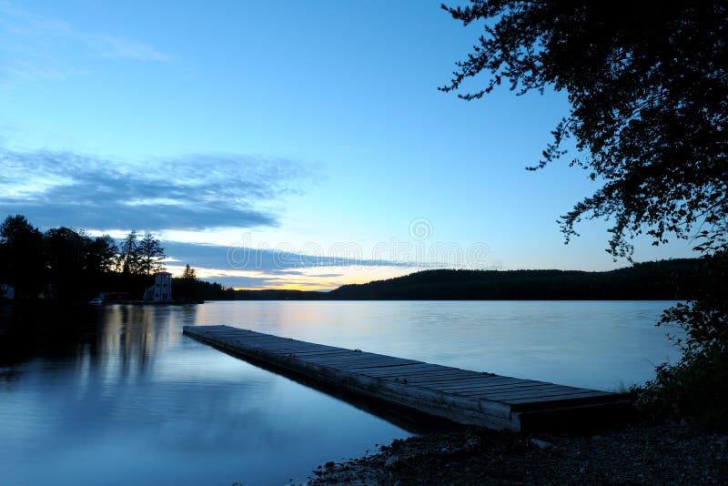 Sunset at the Dock stock photo. Image of sail, boat, dock - 98744644