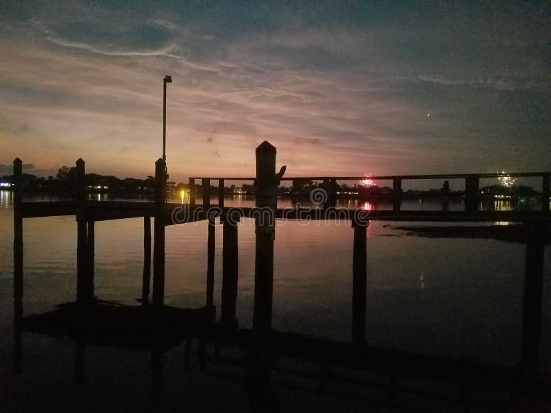 Sunset on dock stock image. Image of ocean, florida - 152445685