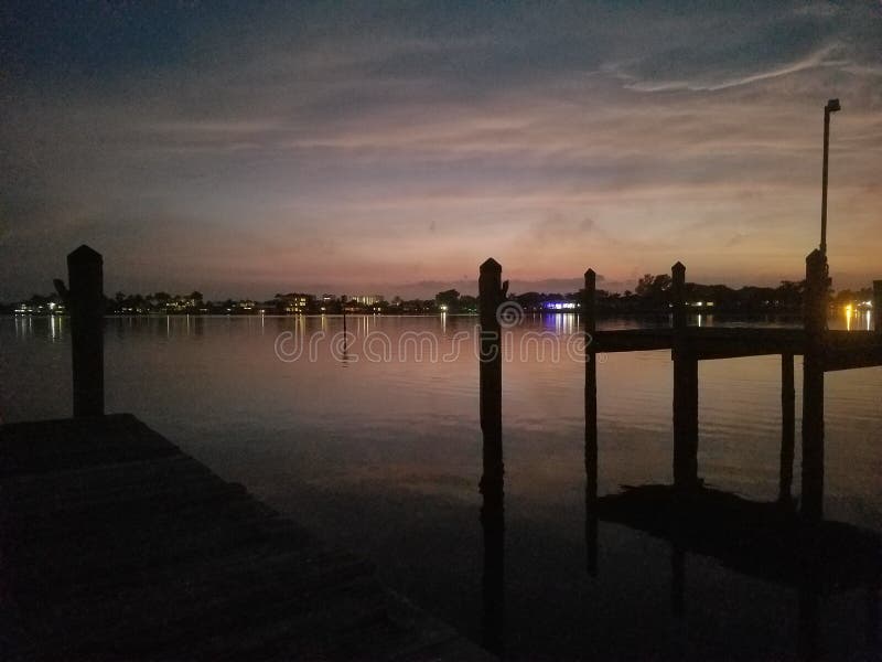 Sunset on dock stock image. Image of dock, florida, water - 152445681