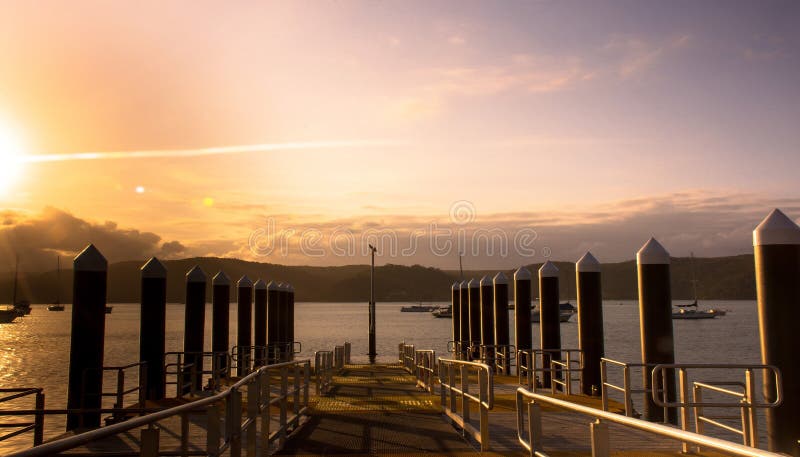 Sunset at docks stock photo. Image of sunset, sunrays - 84854092