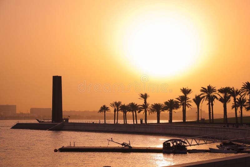 Sunset in Doha stock image. Image of bridge, water, park - 124852211