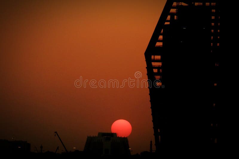 Sunset at Doha Qatar stock image. Image of setting, qatar - 157115417