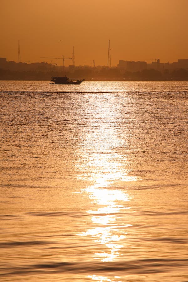 Sunset in Doha stock photo. Image of corniche, water - 124786356
