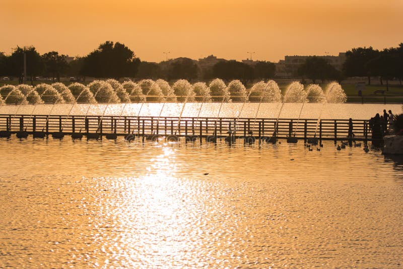 Sunset in Doha stock photo. Image of qatar, water, park - 124852250