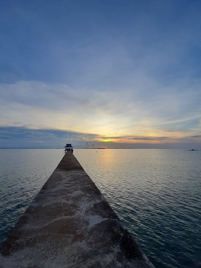 Sunset from dompak island stock image. Image of sunset - 203093243