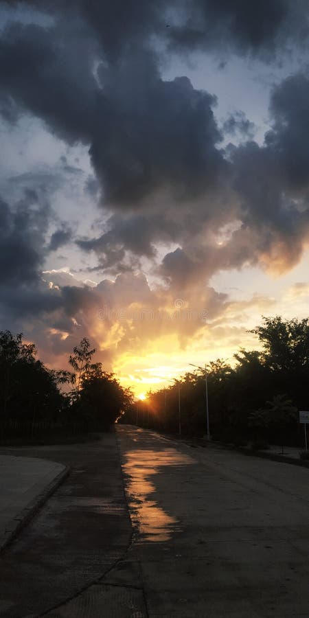 Sunset down to the clouds stock image. Image of cloud - 201229165