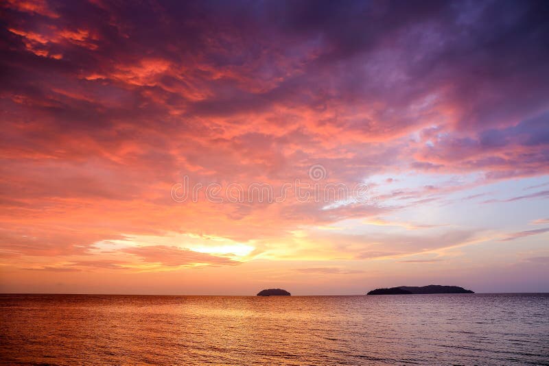 Sunset with Dramatic Clouds on the Tropical Beach Stock Photo - Image ...