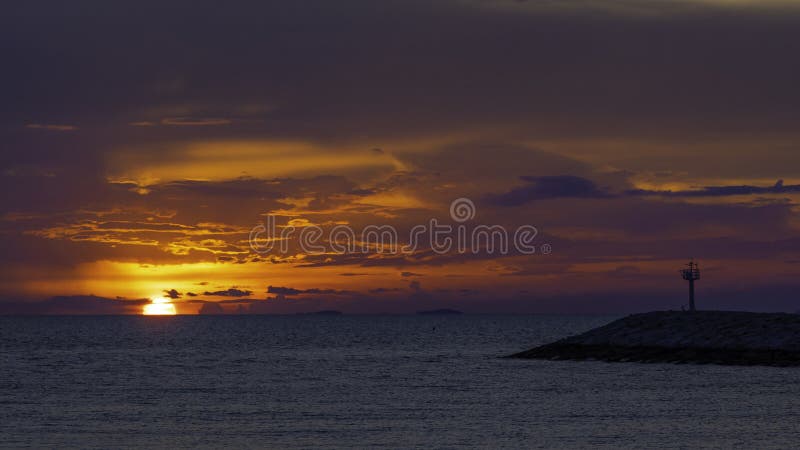 Sunset with Dramatic Sky and Lighthouse on Island Stock Photo - Image ...