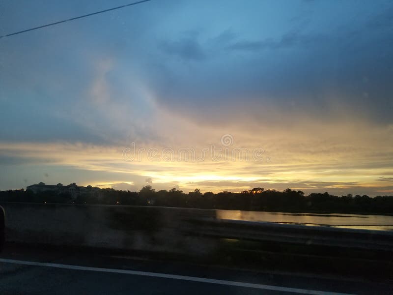 Sunset drive stock image. Image of driving, lake, drive - 96518159