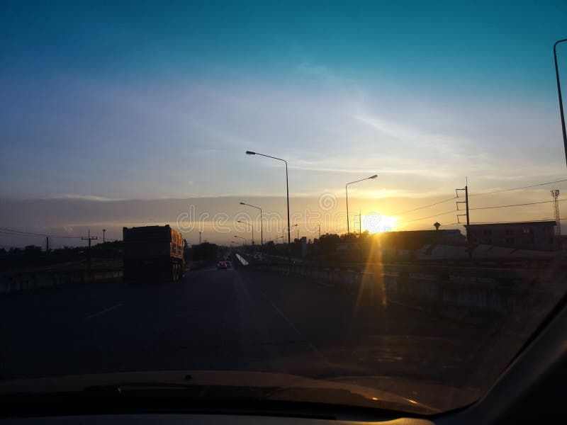 Sunset while Driving on the Road in the Evening Stock Image - Image of ...