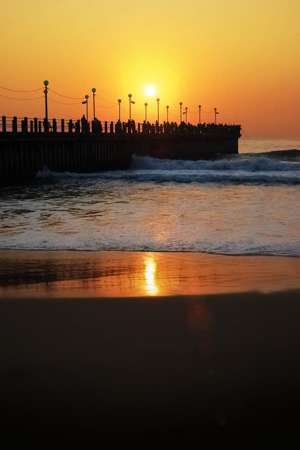 Sunset on Durban Pier stock photo. Image of nightfall - 60853520