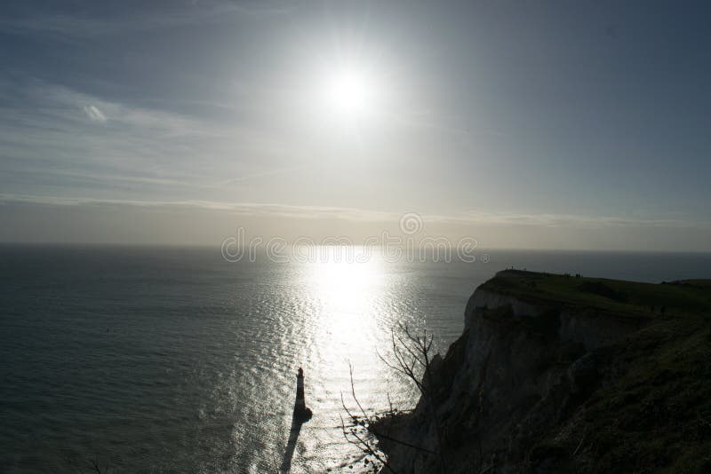 Sunset from the Age of a Cliffs Stock Image - Image of lighthouse ...