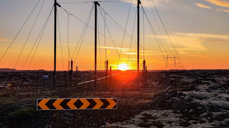 Sunset with Electric Pylons at Blue Lagoon in Iceland Stock Photo ...
