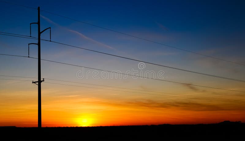 Sunset and Electricity Pole Stock Photo - Image of silhouette, power ...