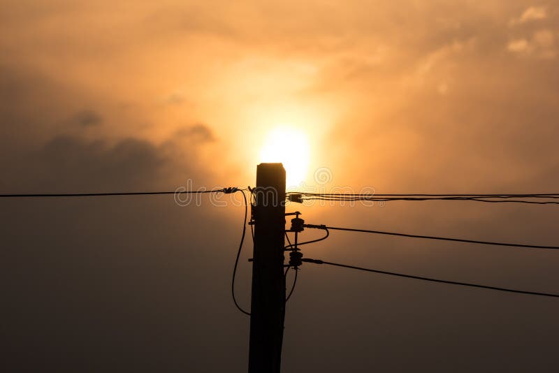 Sunset and Eletricity Line and Electricity Post Stock Photo - Image of ...