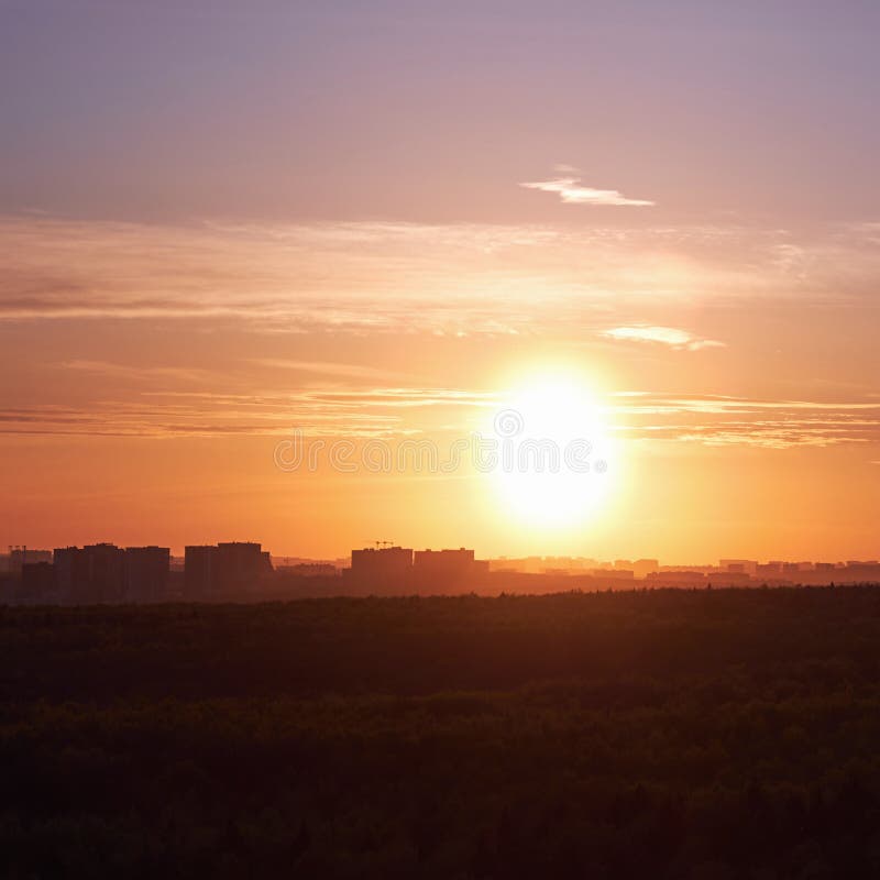 Sunset among the Evening Clouds. Red Sun in the Evening Sky Stock Image - Image of evening ...