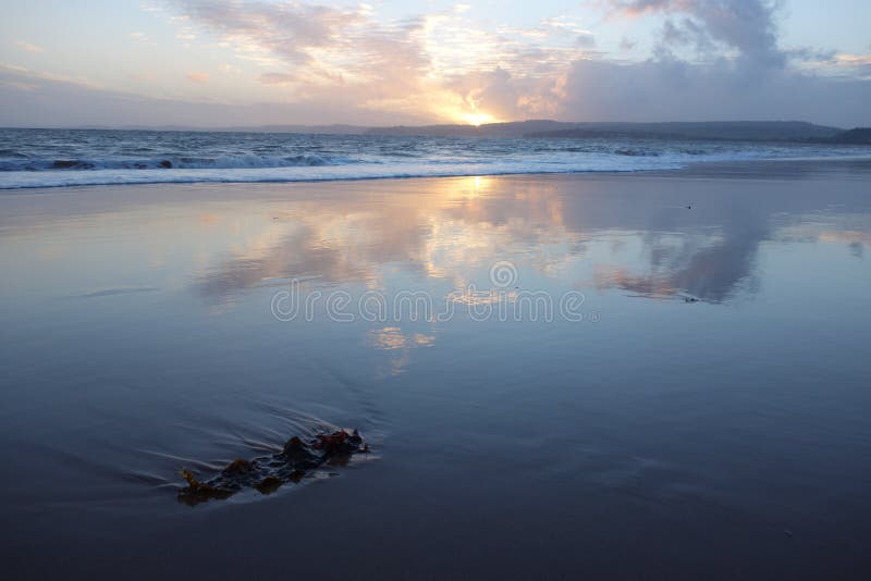 Sunset on Exmouth Beach stock image. Image of reflection - 36695225