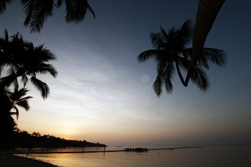 Sunset on exotic beach stock photo. Image of sandy, orange - 45270876