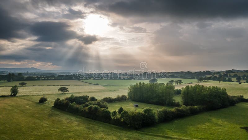 Sunset by the farm land stock photo. Image of alone - 227693752
