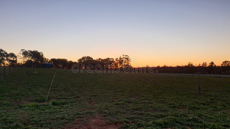 Sunset on farm stock photo. Image of shadows, sunset - 152618732