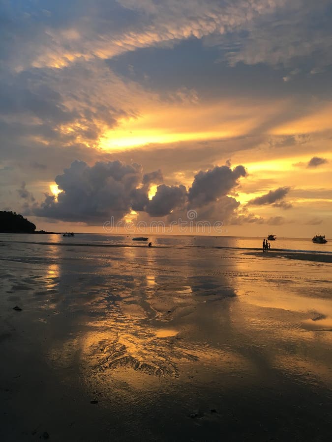 Sunset with Fire Colors during Falling Tide Stock Image - Image of ...