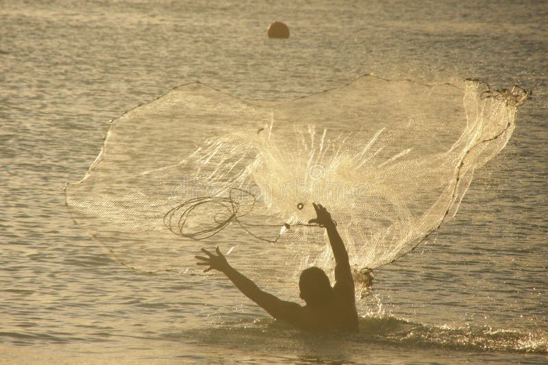 Sunset fishing stock photo. Image of hands, castnet, gold - 5076460