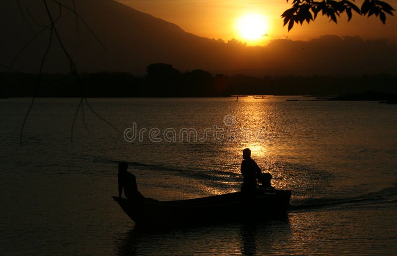 Sunset editorial photo. Image of lake, java, fishing - 32361261