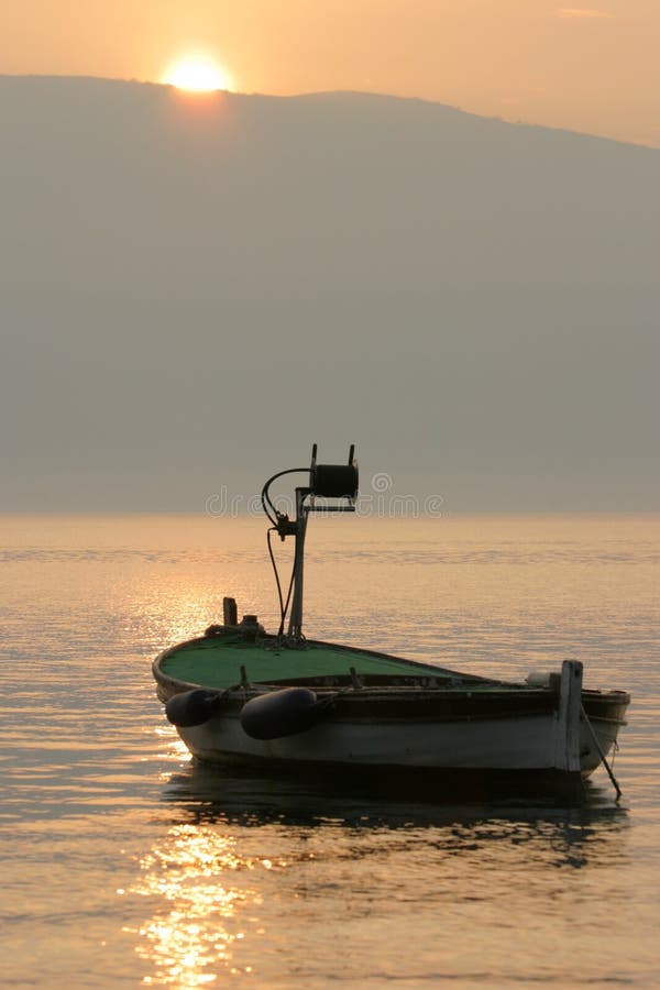 Sunset and fishing boat stock image. Image of sailing, fishing - 152839
