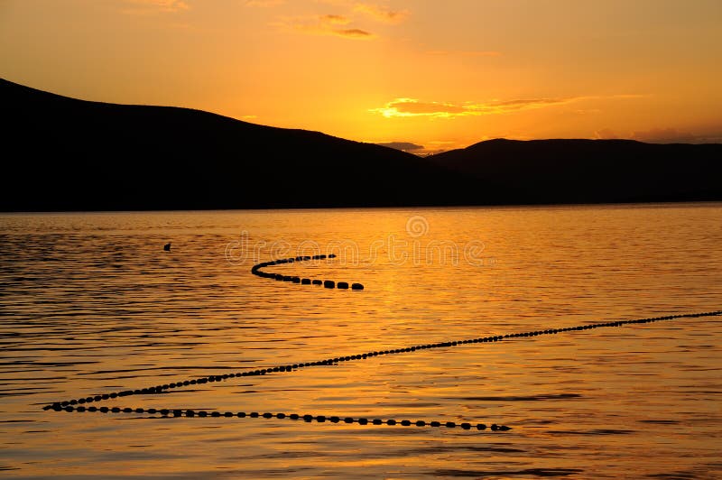 Sunset with fishing nets stock image. Image of sunrise - 18825789