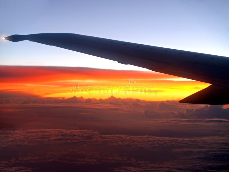 Sunset flight stock image. Image of cloud, aircraft, trip - 1078487