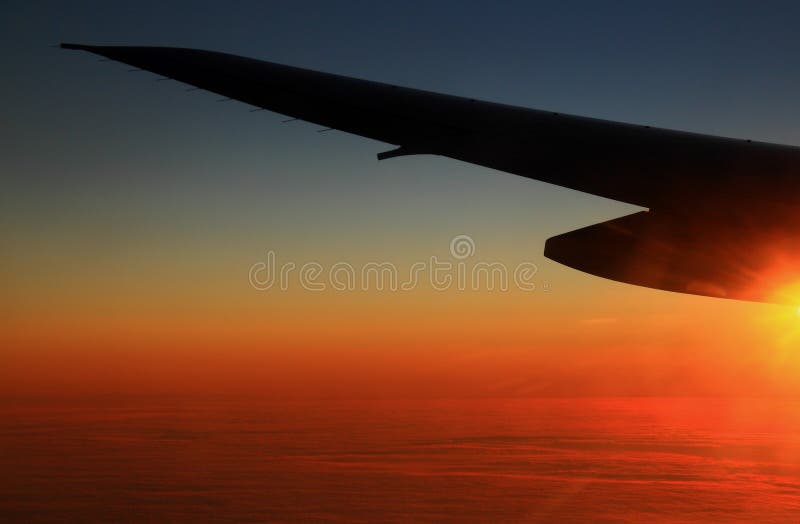 Sunset in flight stock photo. Image of sundown, colorful - 44364866