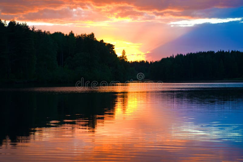 Sunset on the forest lake stock image. Image of dramatic - 20098531